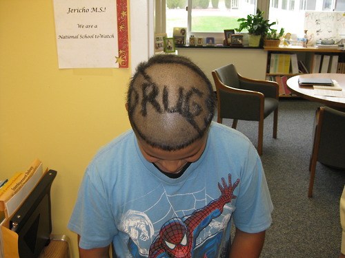 Great Message Makes for Bad Hair - Poorly Dressed - fashion fail