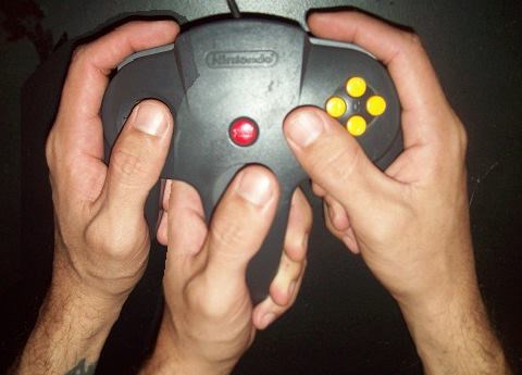 proper way to hold your n64 controller - Geek Universe - Geek | Fanart ...